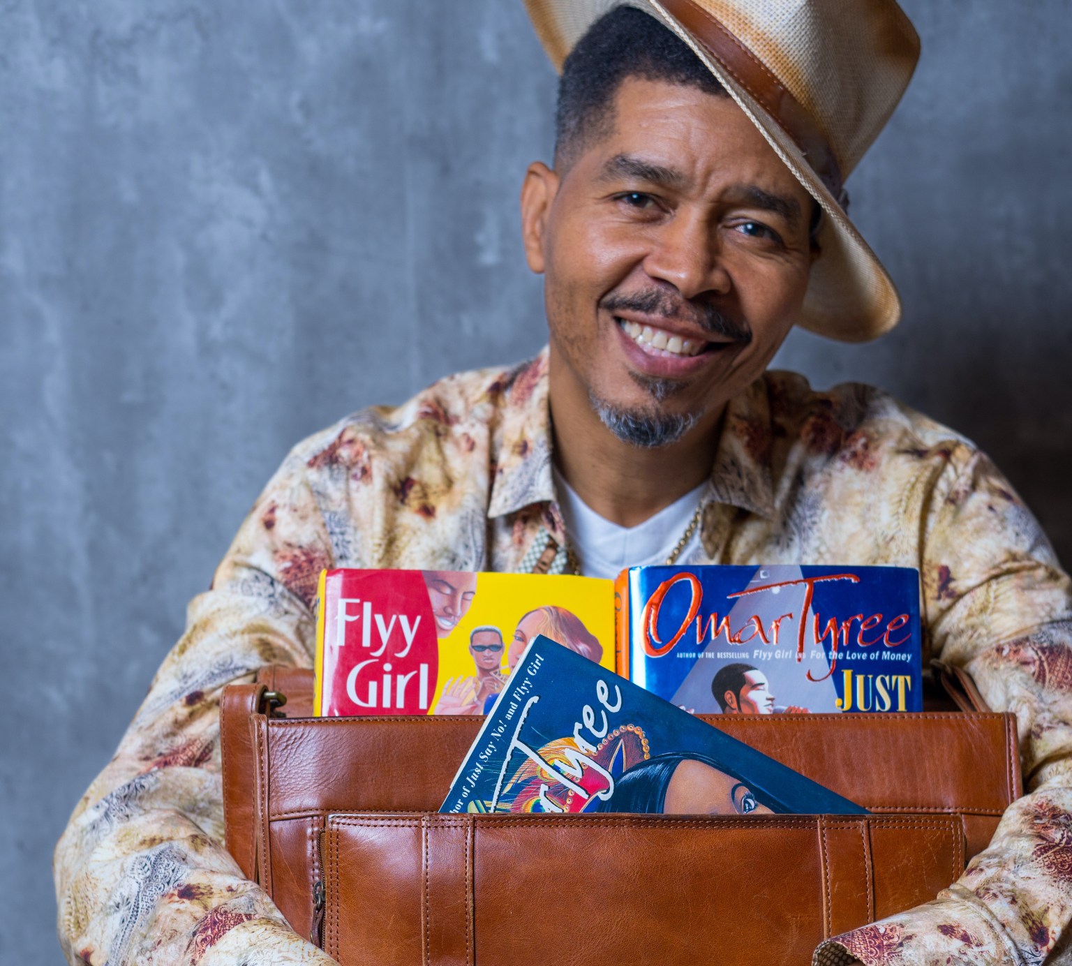 Omar Tyree Makes Literary Return, Holds Tight to Big Dreams, Embarks on ...